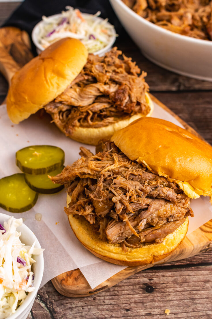 Easy to make with six ingredients, slow-cooked pulled pork infused with ...